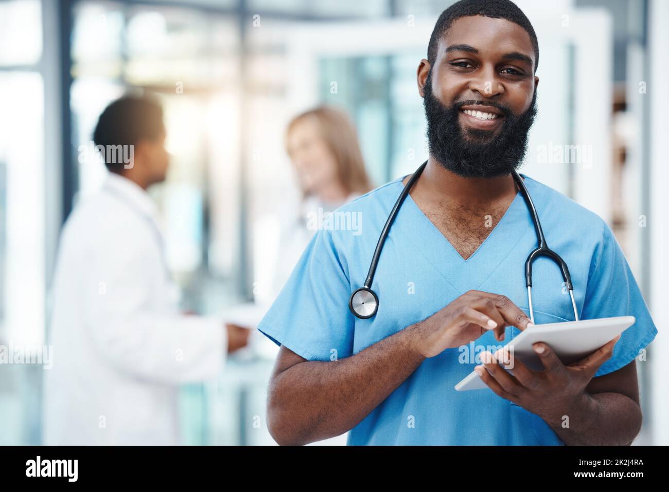 Tablet, nurse and portrait of a black man with hospital software app ...