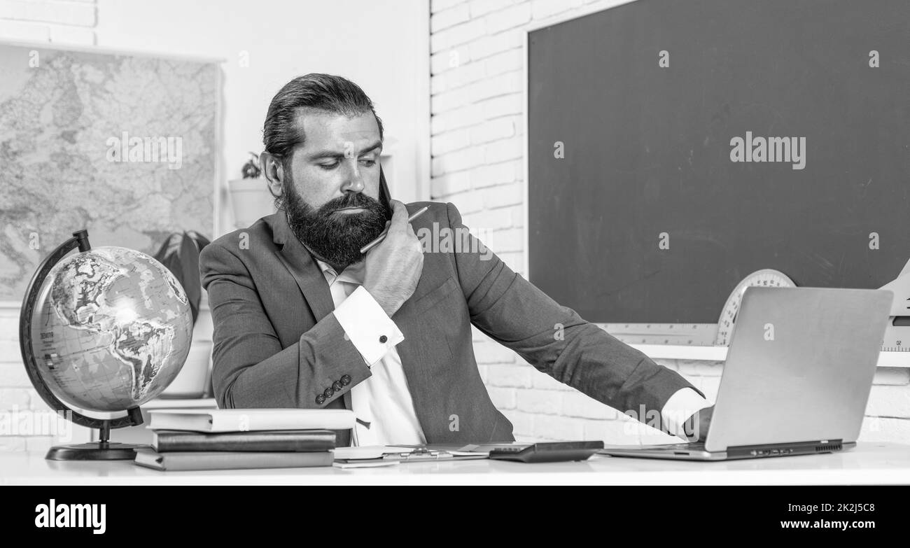 brutal unshaven guy university lecturer in classroom, teachers day ...