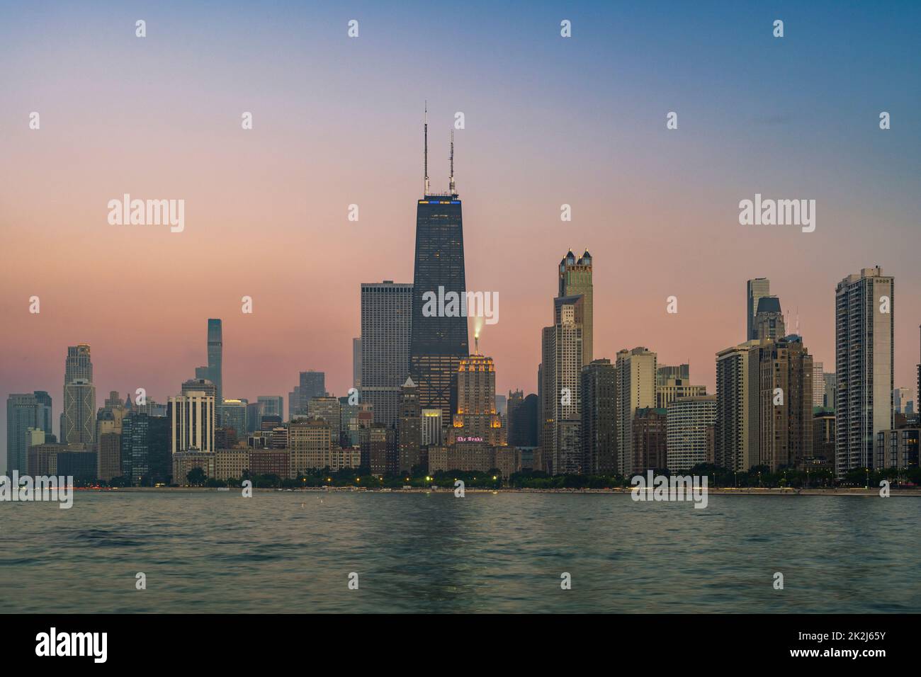 Sunset view over downtown skyline from Lake Michigan, Chicago, Illinois ...