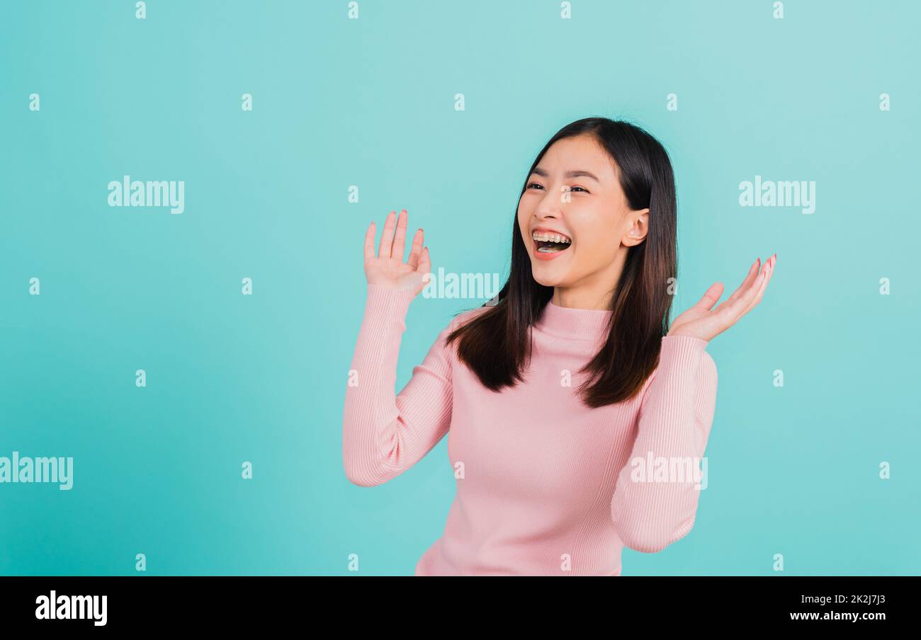 Happy young Asian beautiful woman smiling wear silicone orthodontic ...