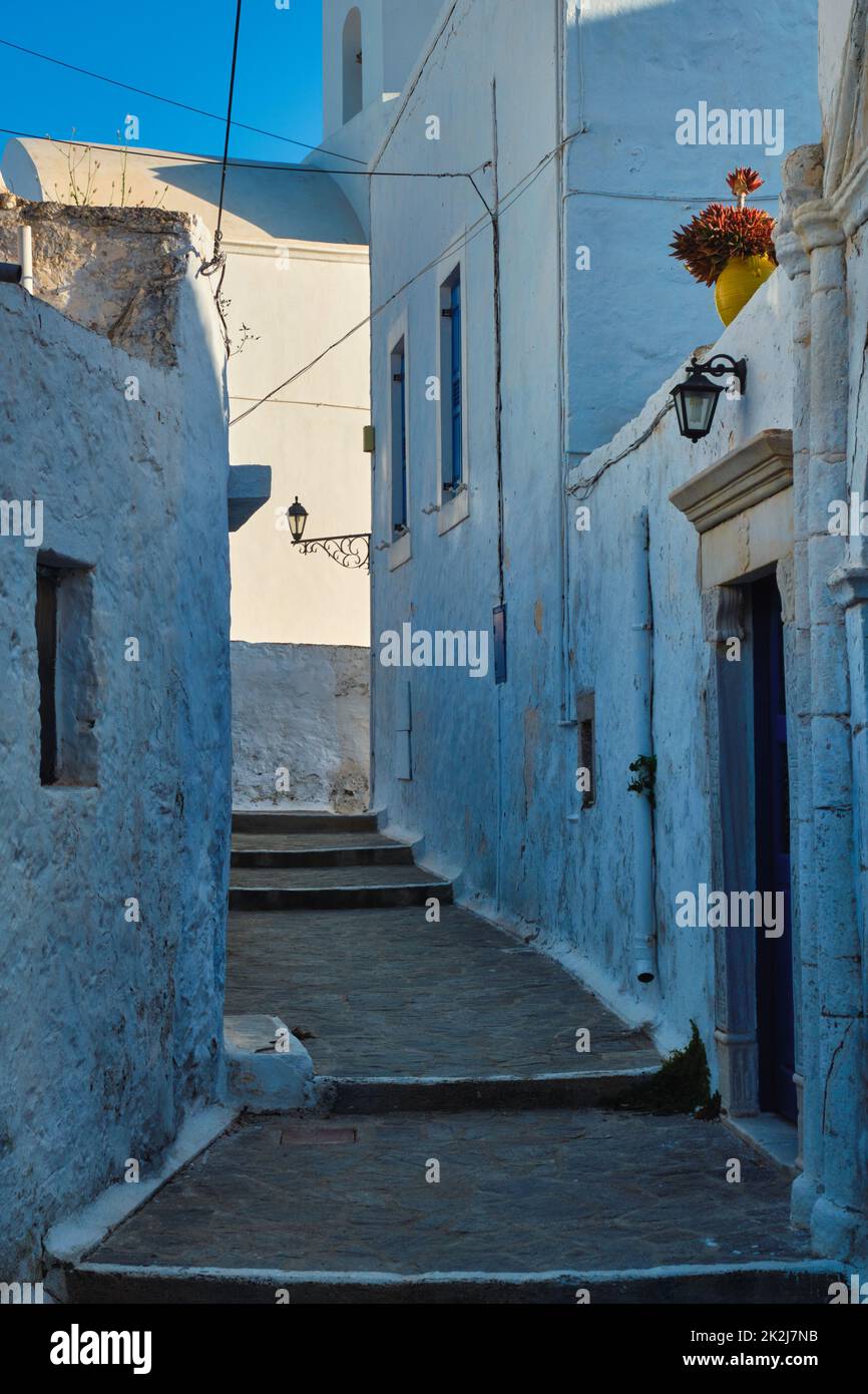 Greek village typical view with whitewashed houses and stairs. Plaka ...