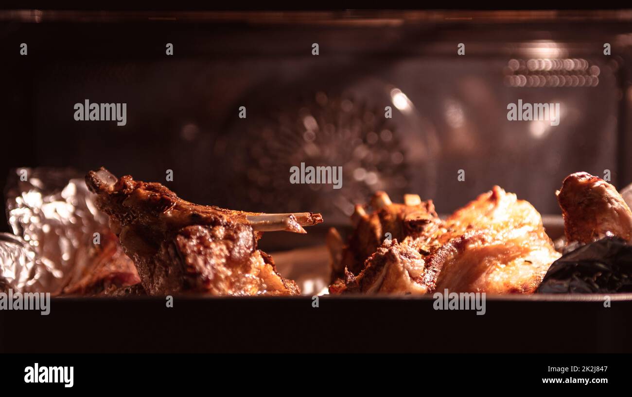 The lamb cooked in the oven close-up Stock Photo - Alamy