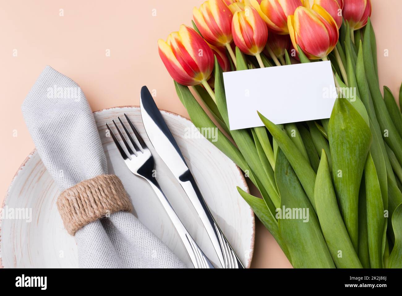 Elegantly holiday dinner table. Festive table setting at neutral beige ...