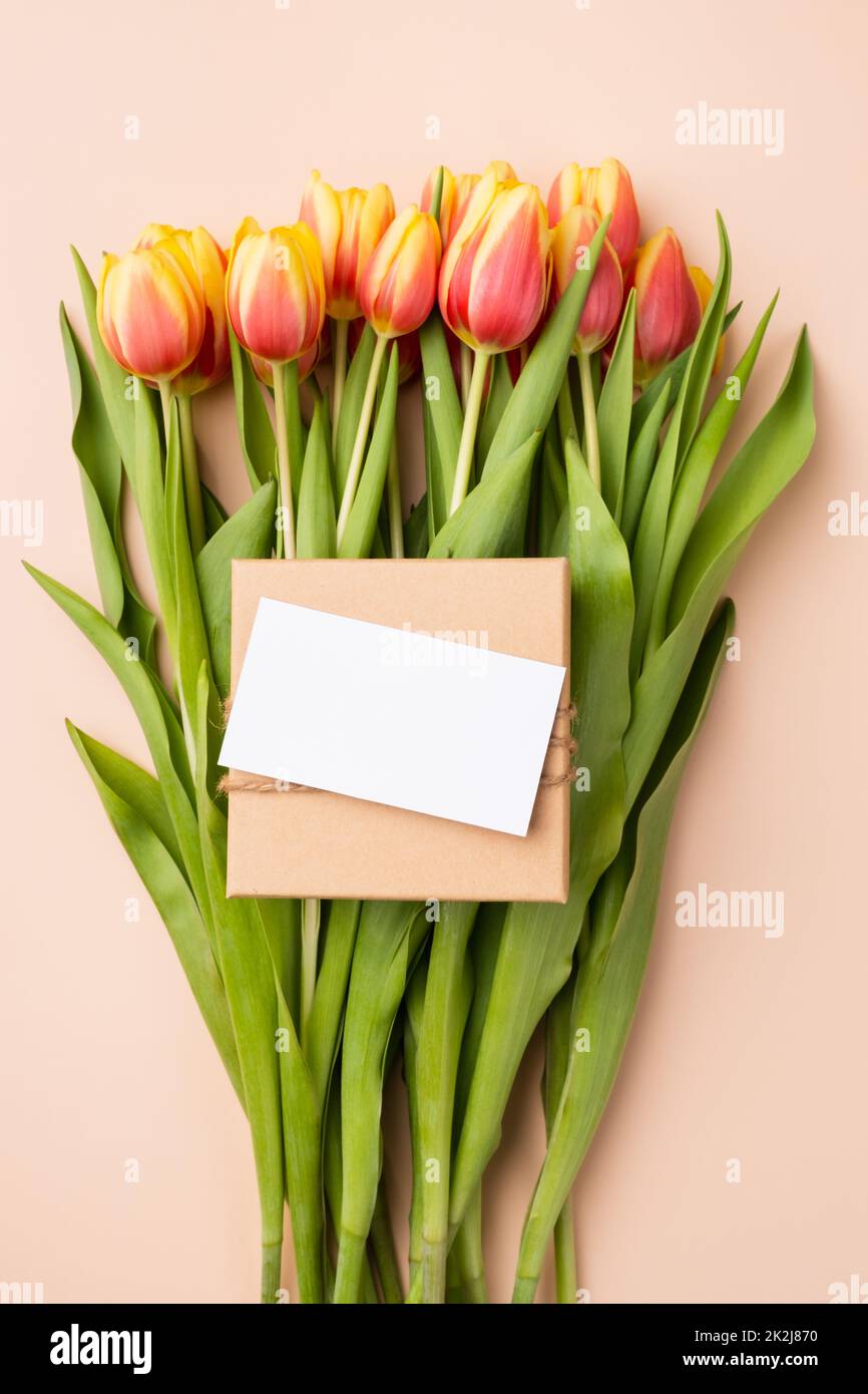 Greeting card mockup or thank you card template. Bouquet of tulips and ...
