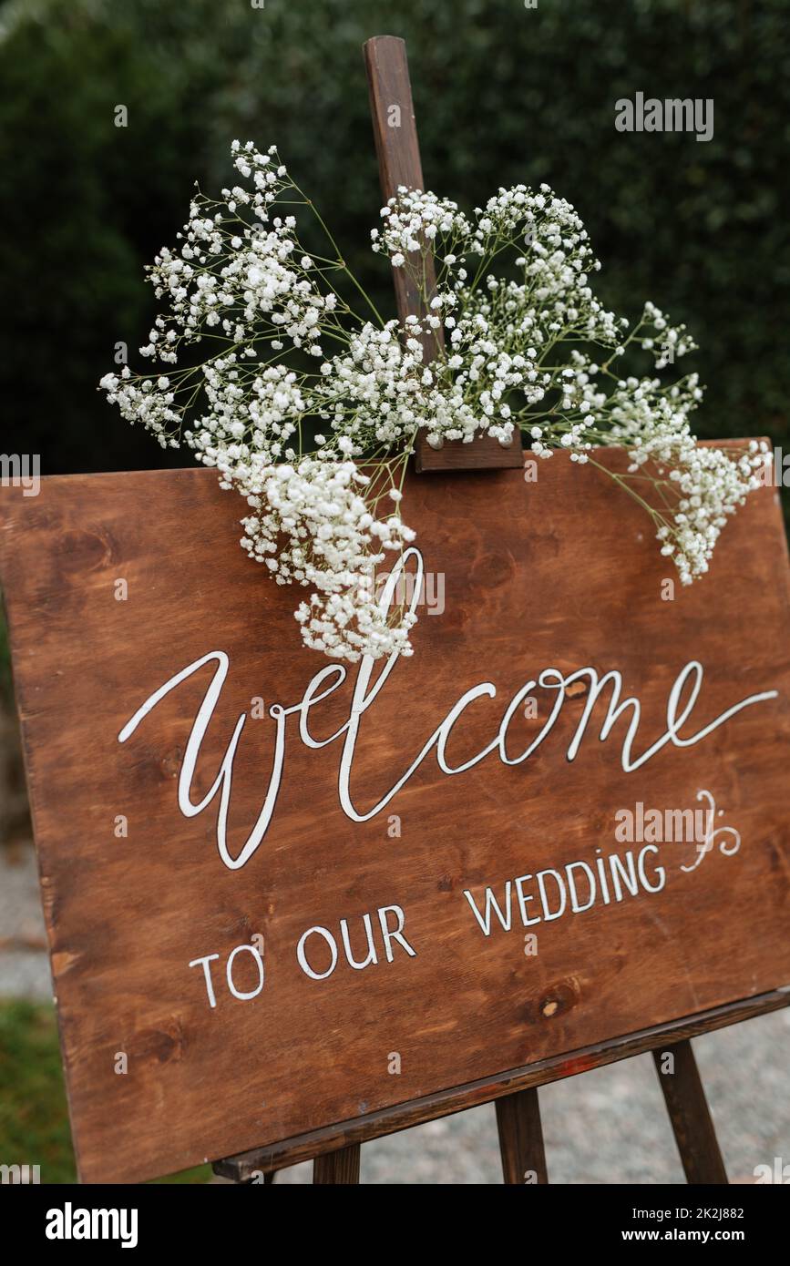 sign welcome to the event Stock Photo - Alamy