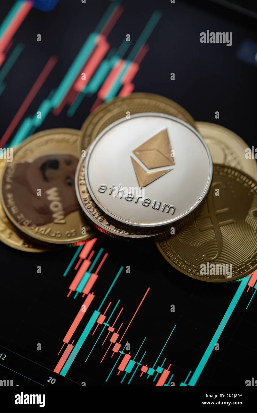 Various Cryptocurrencies with candle stick graph chart and digital ...