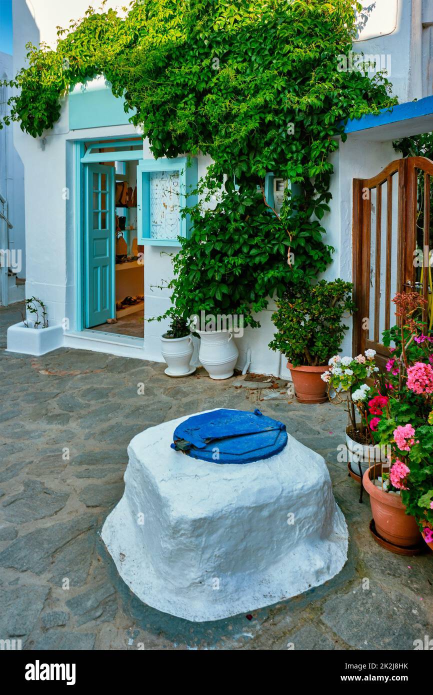 Greek village typical view with whitewashed houses and stairs. Plaka ...