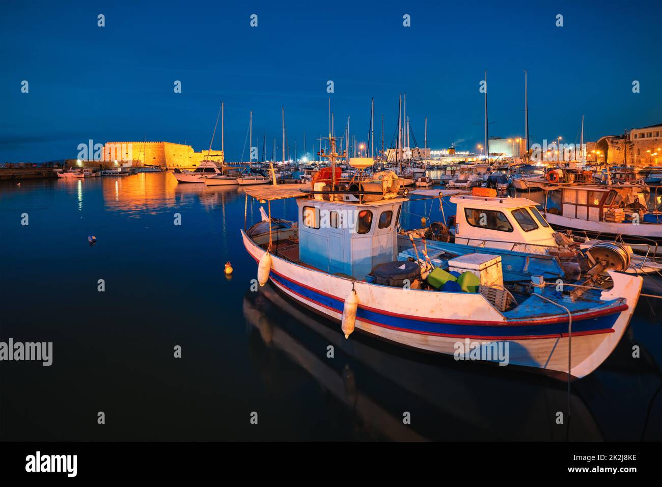 Venetian Fort in Heraklion and moored fishing boats, Crete Island ...