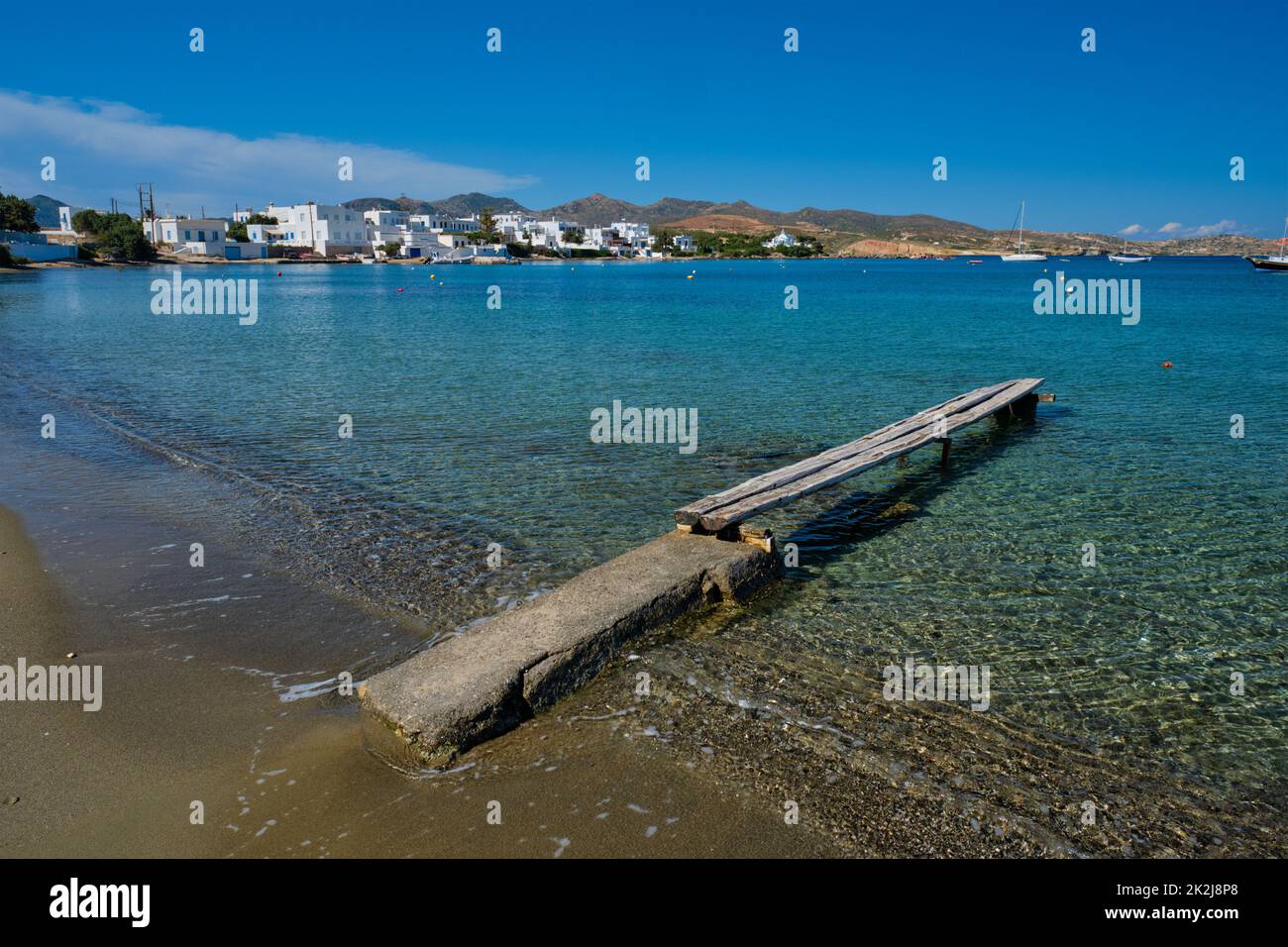 The beach and fishing village of Pollonia in Milos, Greece Stock Photo ...