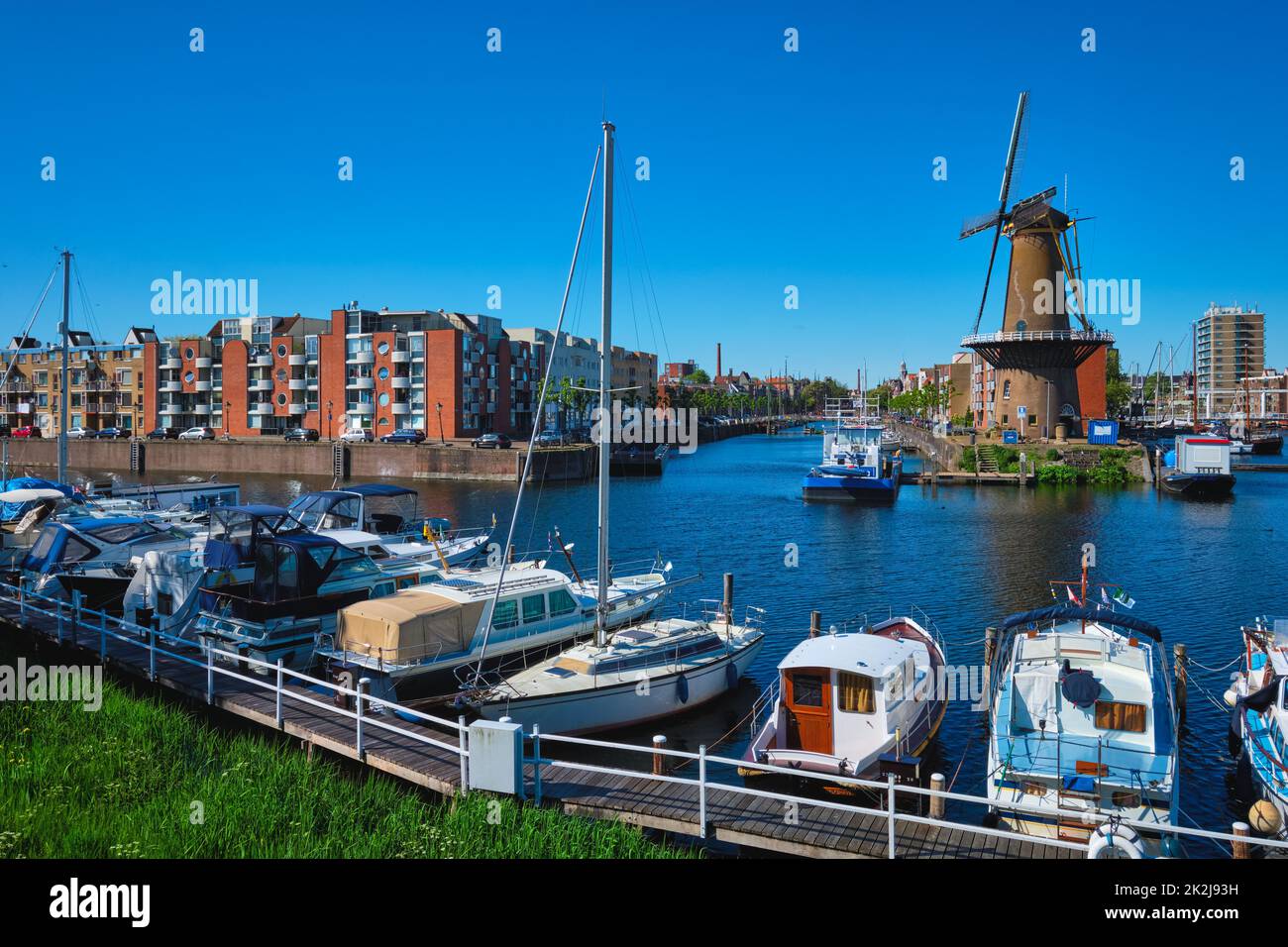 View of the harbour of Delfshaven and the old grain mill De ...
