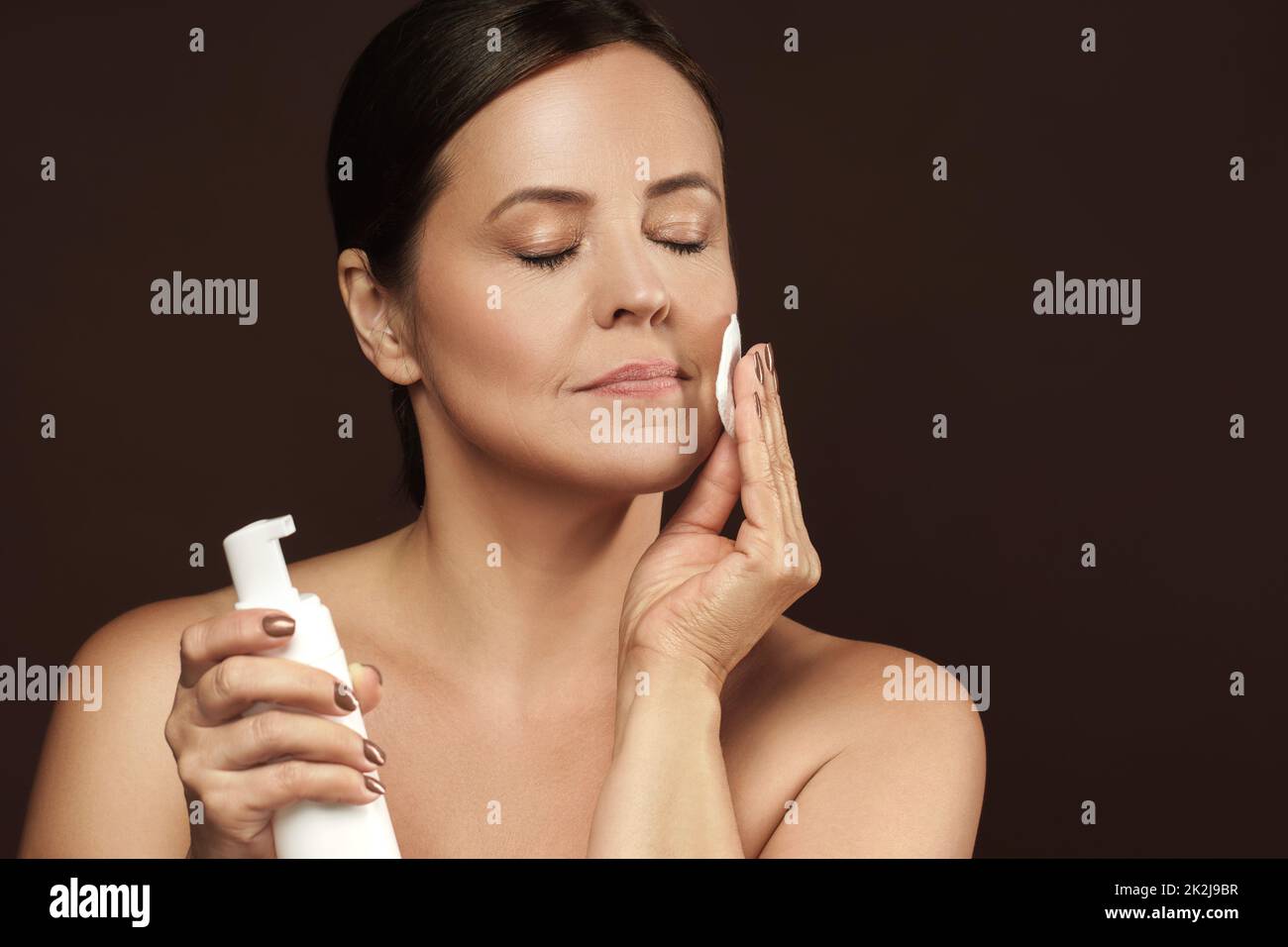 Beautiful mature woman bottle hi-res stock photography and images - Alamy