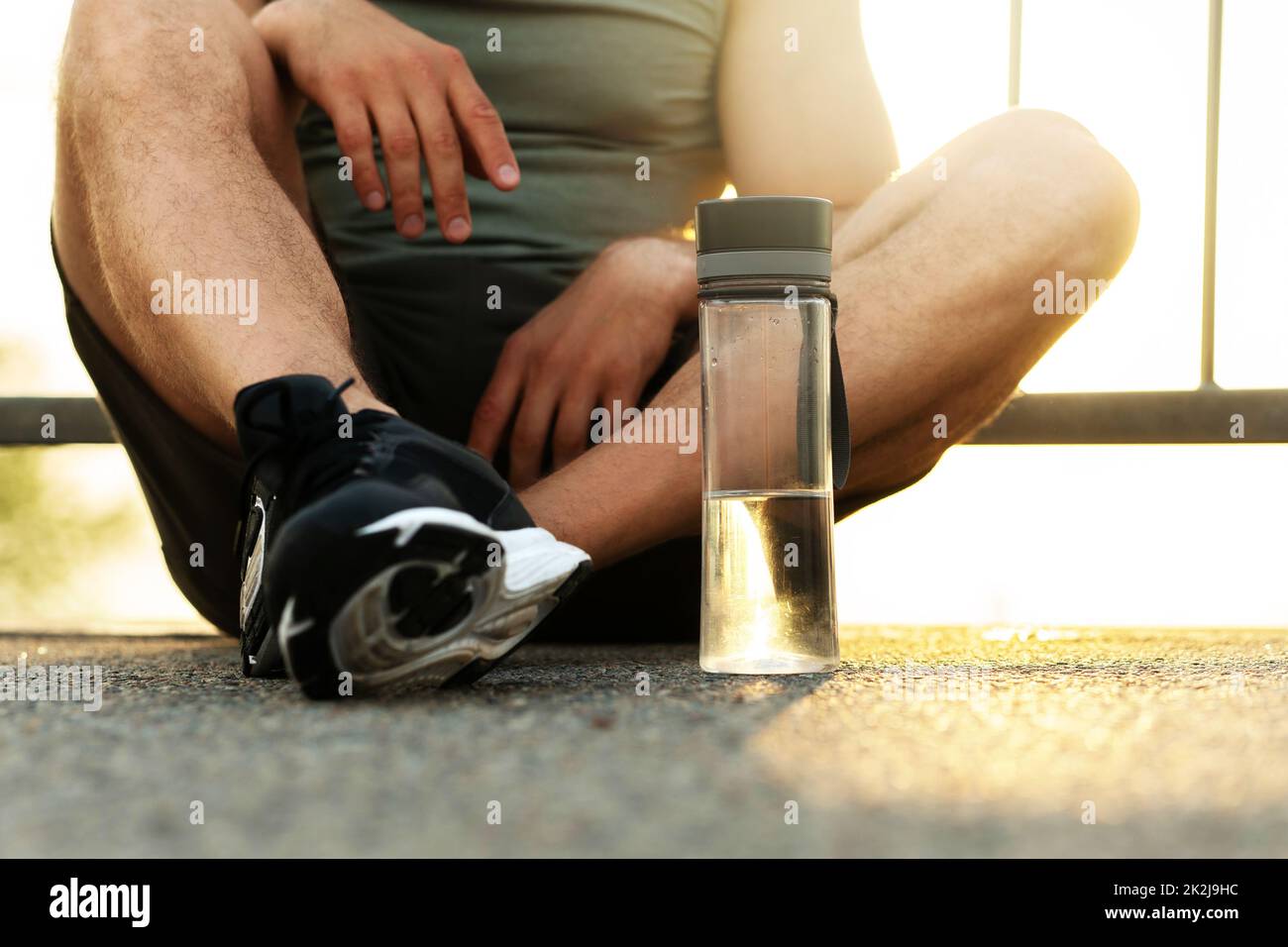 Athlete sitting on running hi-res stock photography and images - Alamy
