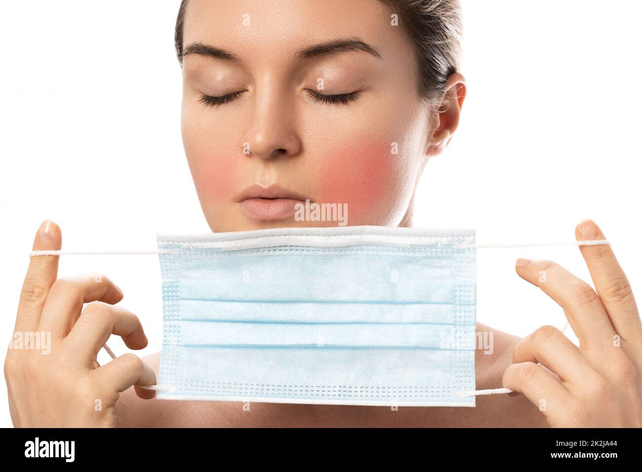 Maskne - acne breakouts from wearing a face mask Stock Photo - Alamy