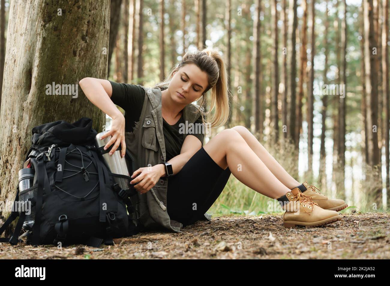 Female hiker sitting in hi-res stock photography and images - Alamy