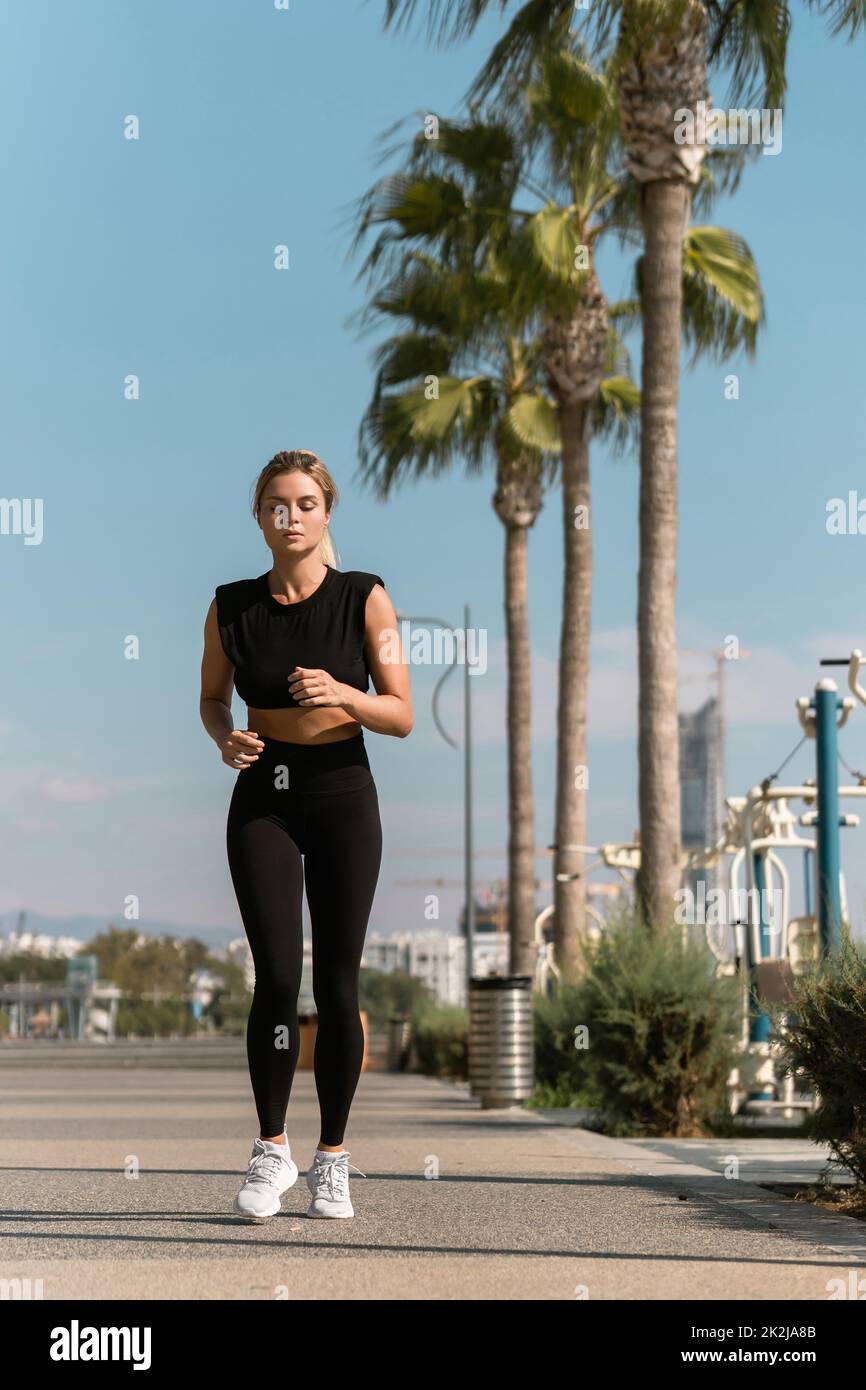 Fit girl running cardio workout hi-res stock photography and images - Alamy