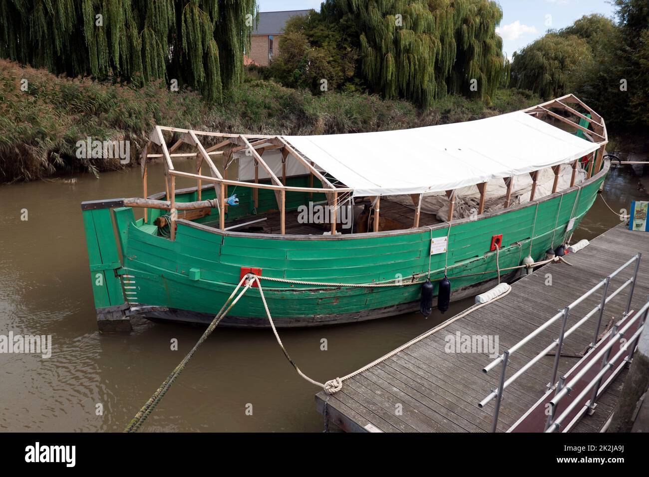 The restored Hull of an old wooden fishing boat being transformed into ...