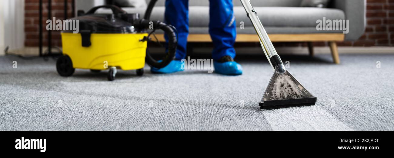 Janitor cleaning floor vacuum cleaner hi-res stock photography and ...