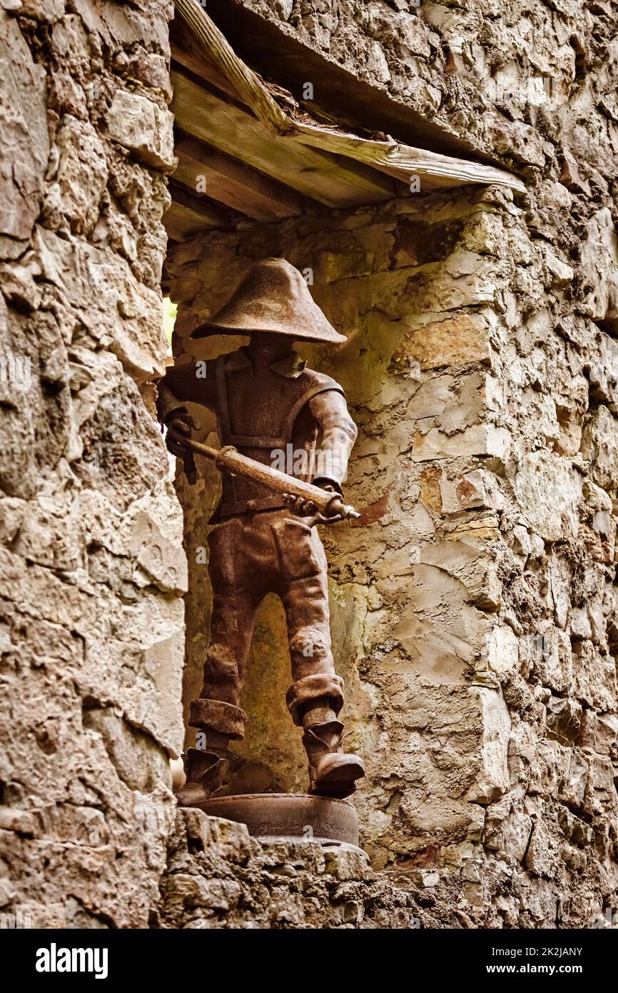 Metal statue of a fireman Stock Photo - Alamy