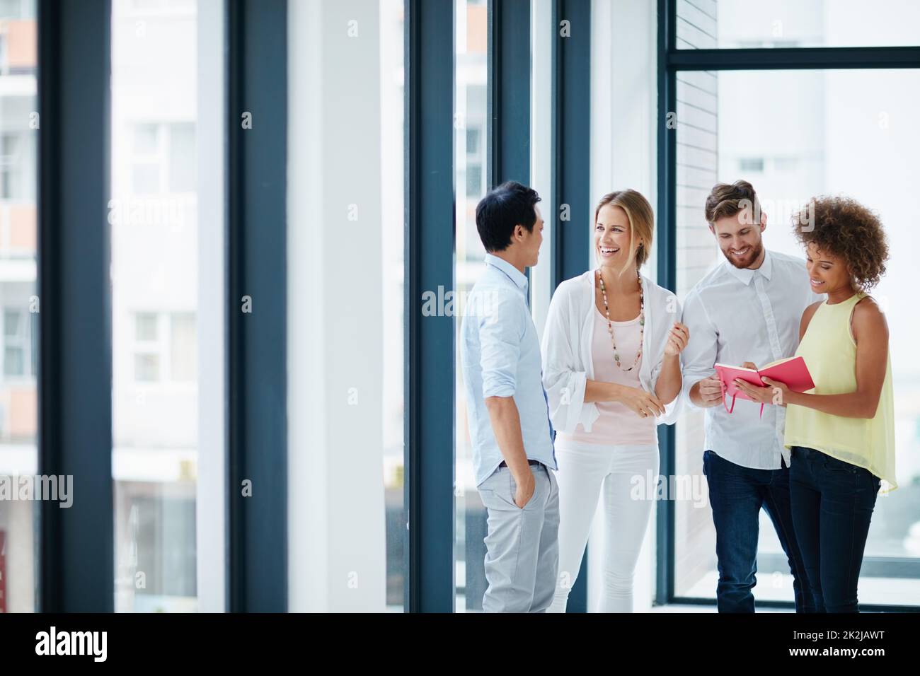 Good communication is the heart of a great team. Shot of a group of ...