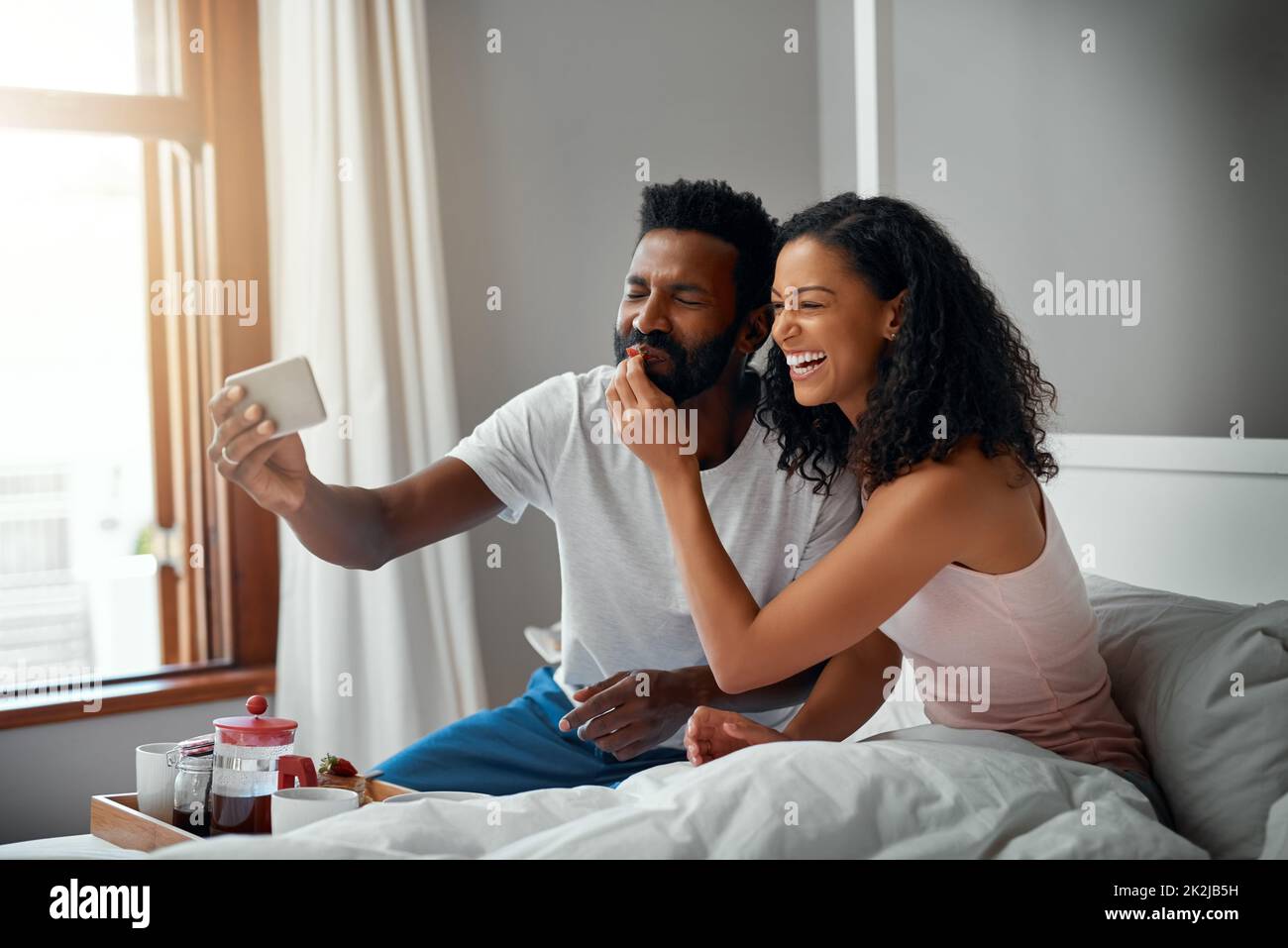 Young couple suggestive hi-res stock photography and images - Alamy