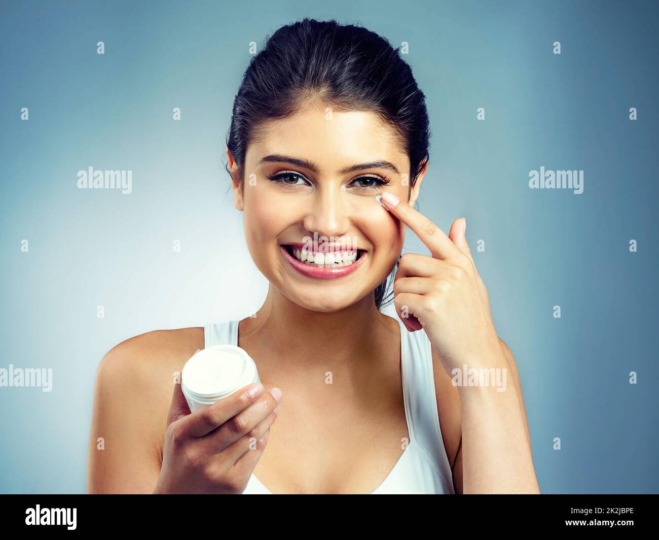 Live your healthy life. Studio portrait of an attractive young woman ...