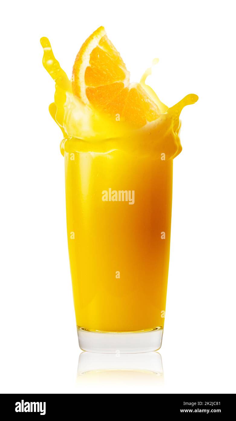 Orange slice flying in tall glass of orange juice Stock Photo - Alamy