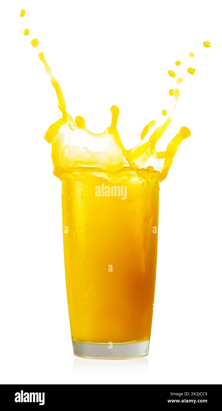 Splash of orange juice in high glass Stock Photo - Alamy