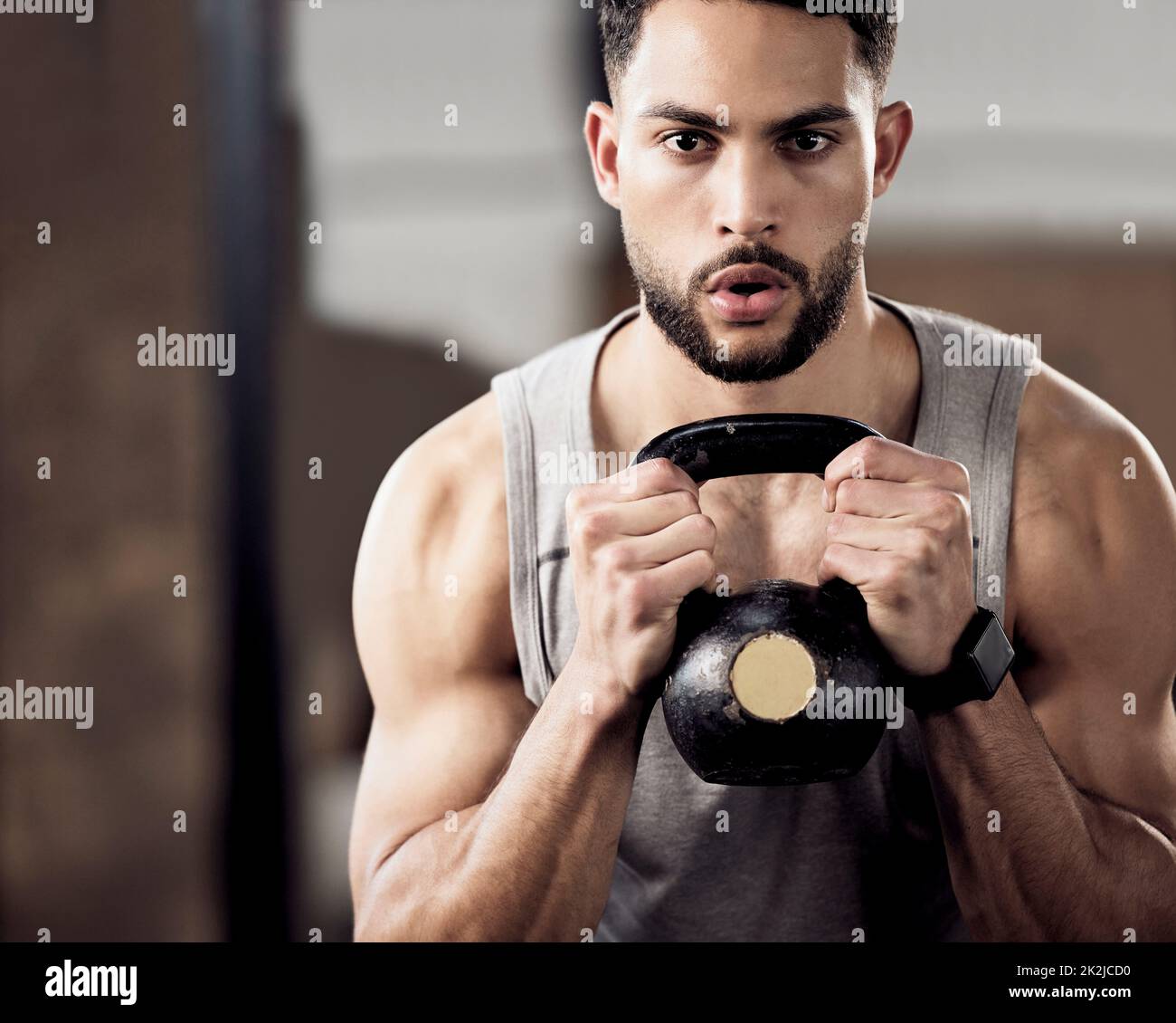 Dont Count The Days Make The Days Count Shot Of A Young Man Doing Squats With Weights In Gym