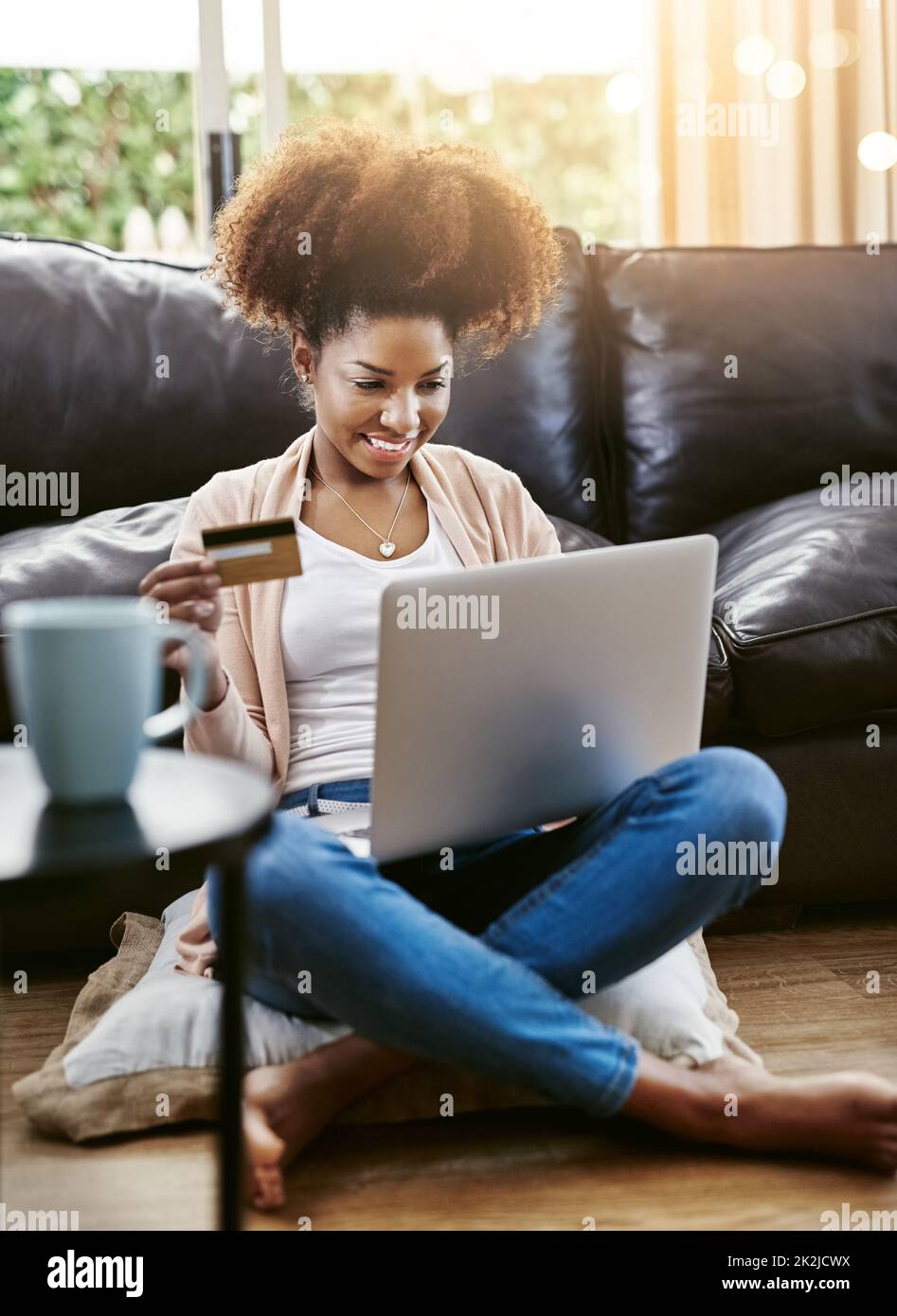 Its time to spend some money. Shot of an attractive young woman ... Its time to spend some money. Shot of an attractive young woman ...