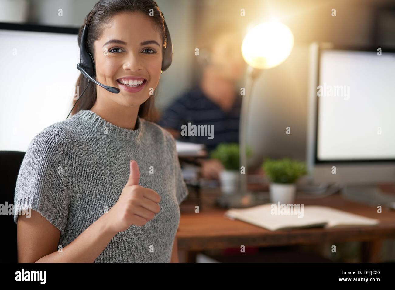 Call center agents thumbs hi-res stock photography and images - Alamy