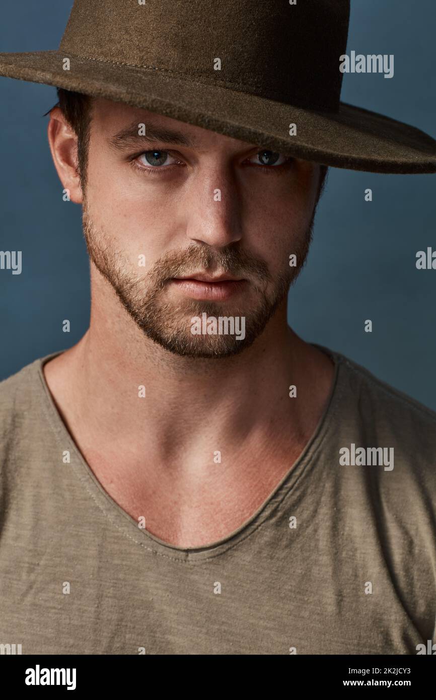 Portrait of fashionable man wearing hat hi-res stock photography and ...