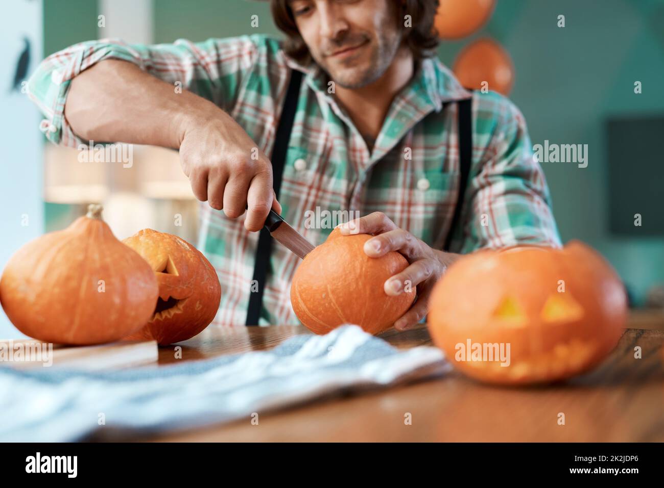 Man and pumpkin hi-res stock photography and images - Alamy