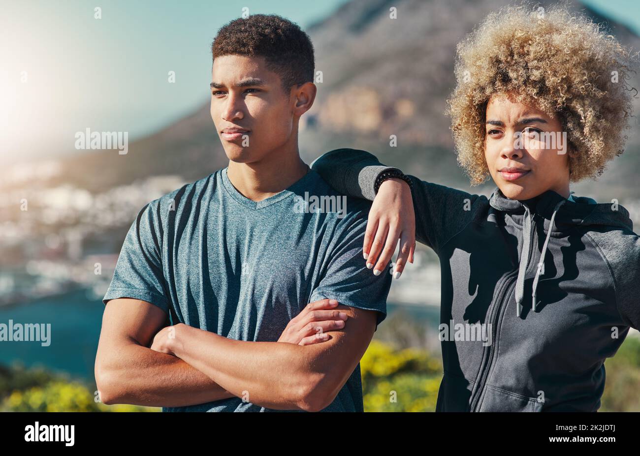 Well make it to the finish line together. Cropped shot of a determined ...