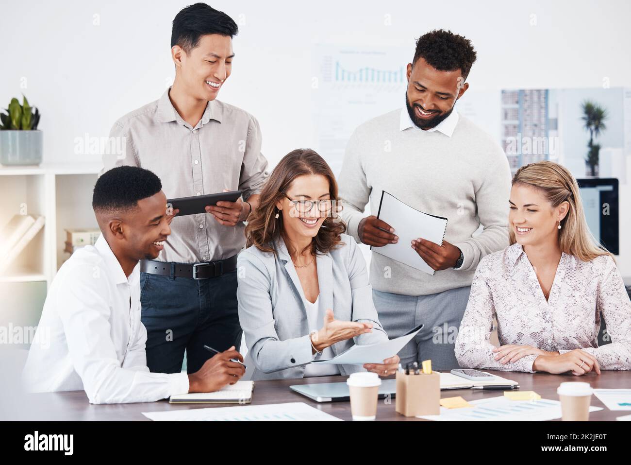 People, manager and business meeting paperwork discussion, KPI review or finance report with ...