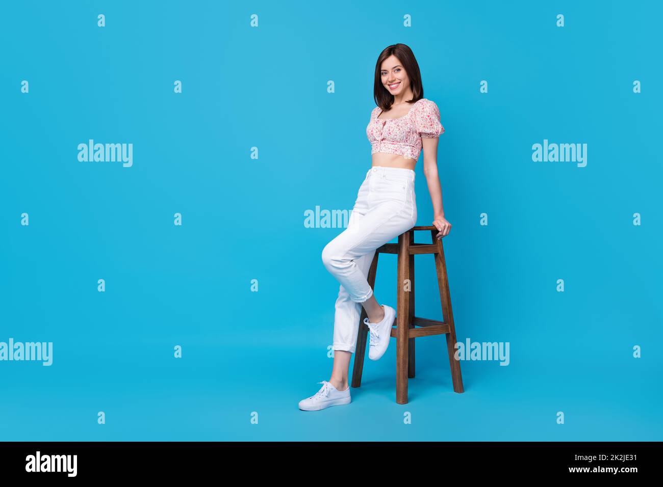 Full length photo of nice positive lady sit comfort chair bar wait ...