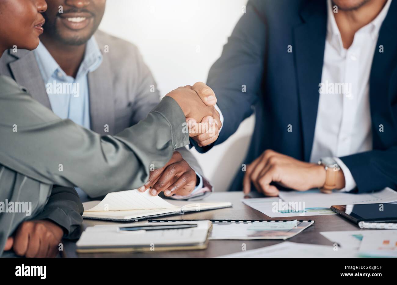 Partnership, collaboration and deal by handshake with business people ...