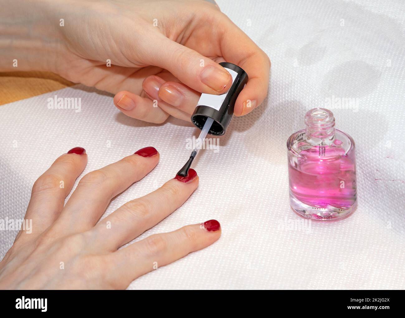 Shiny red nails hi-res stock photography and images - Alamy