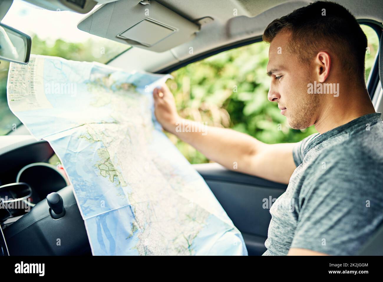 Reading map inside car hi-res stock photography and images - Alamy
