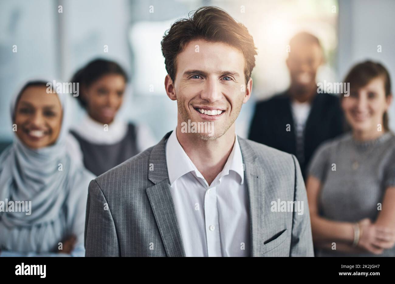 These guys have your back. Portrait of confident young business people ...