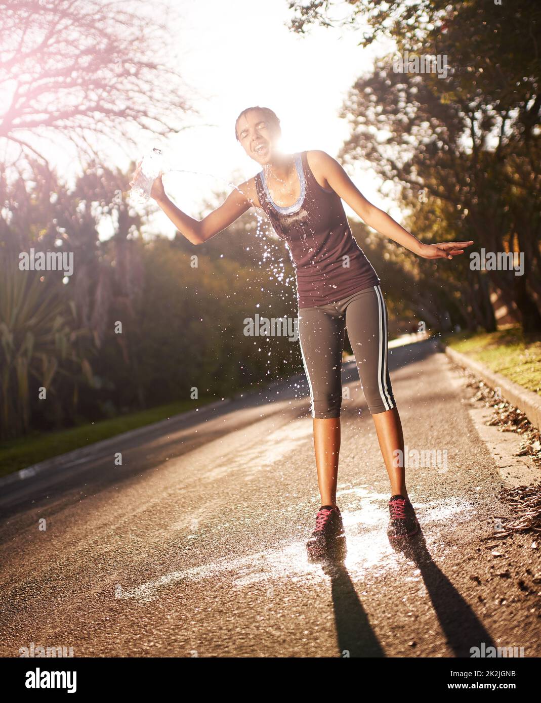 Pouring water over his head hi-res stock photography and images - Alamy