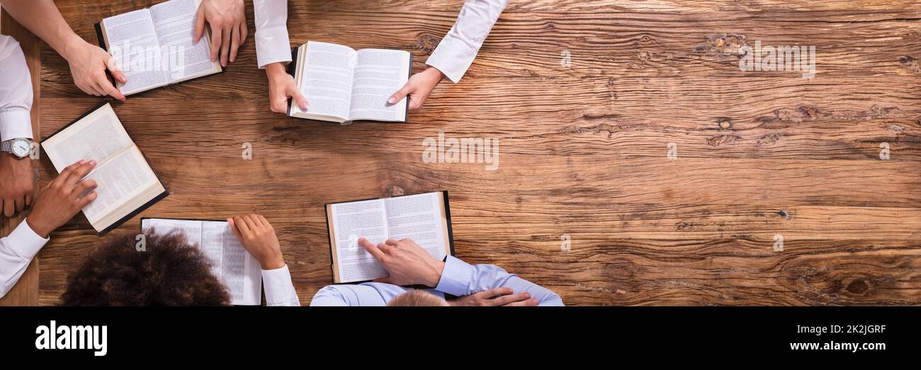 People Reading Holy Books Stock Photo - Alamy