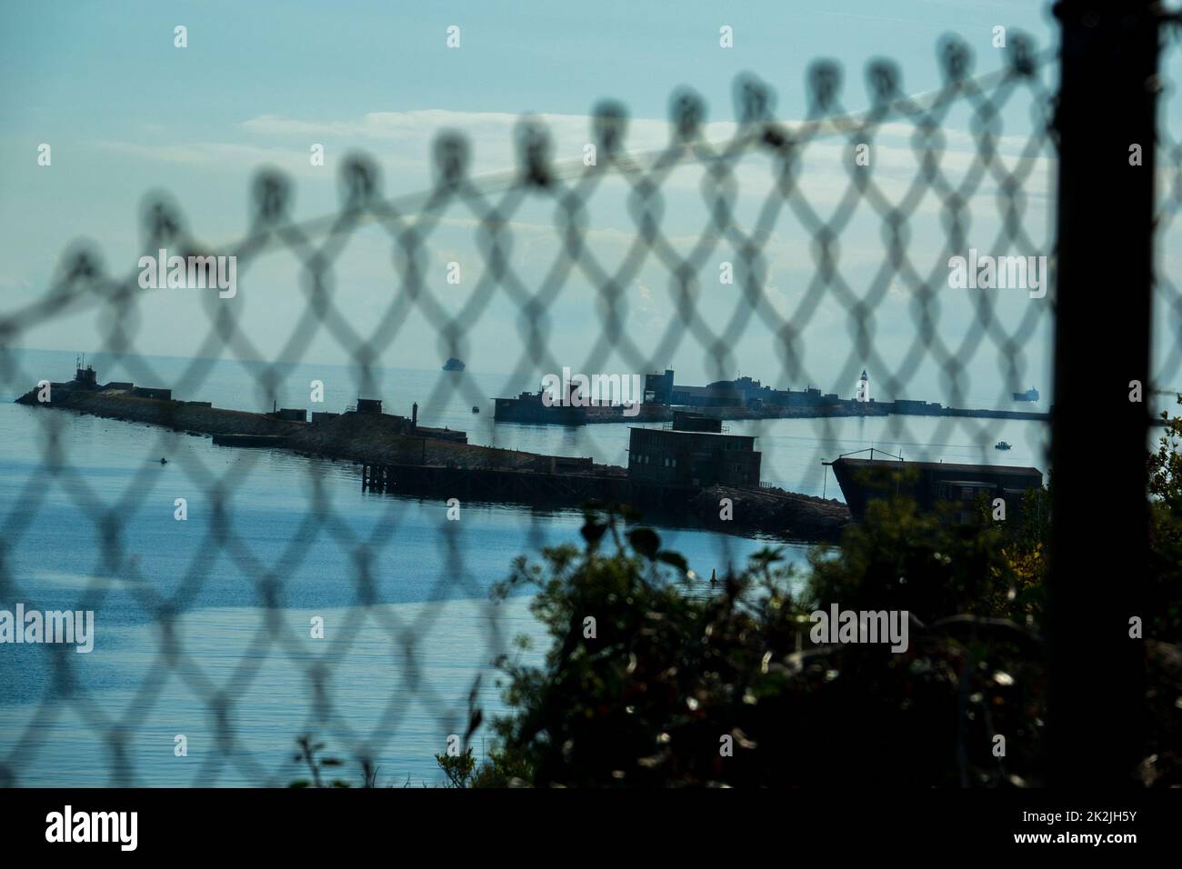Portland Harbour fence Stock Photo - Alamy