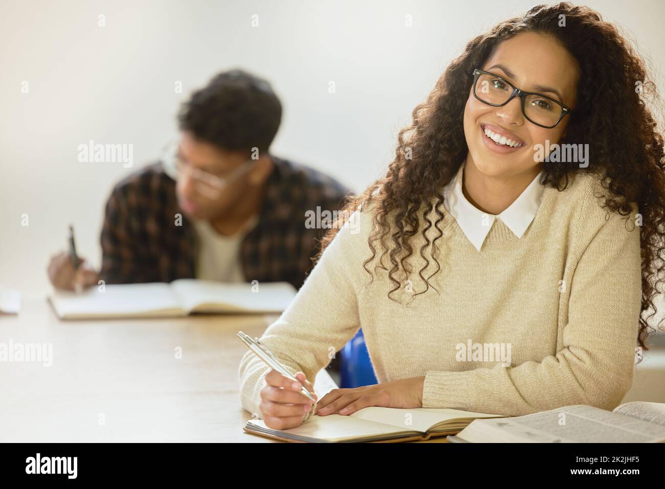 Adult female sitting writing hi-res stock photography and images - Alamy