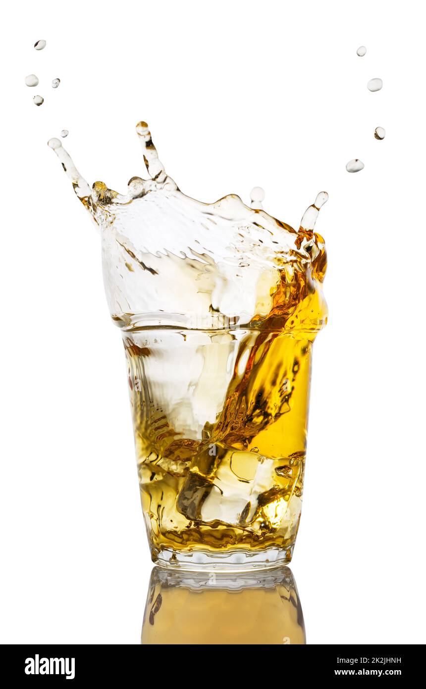 Glass of apple juice with splash Stock Photo - Alamy