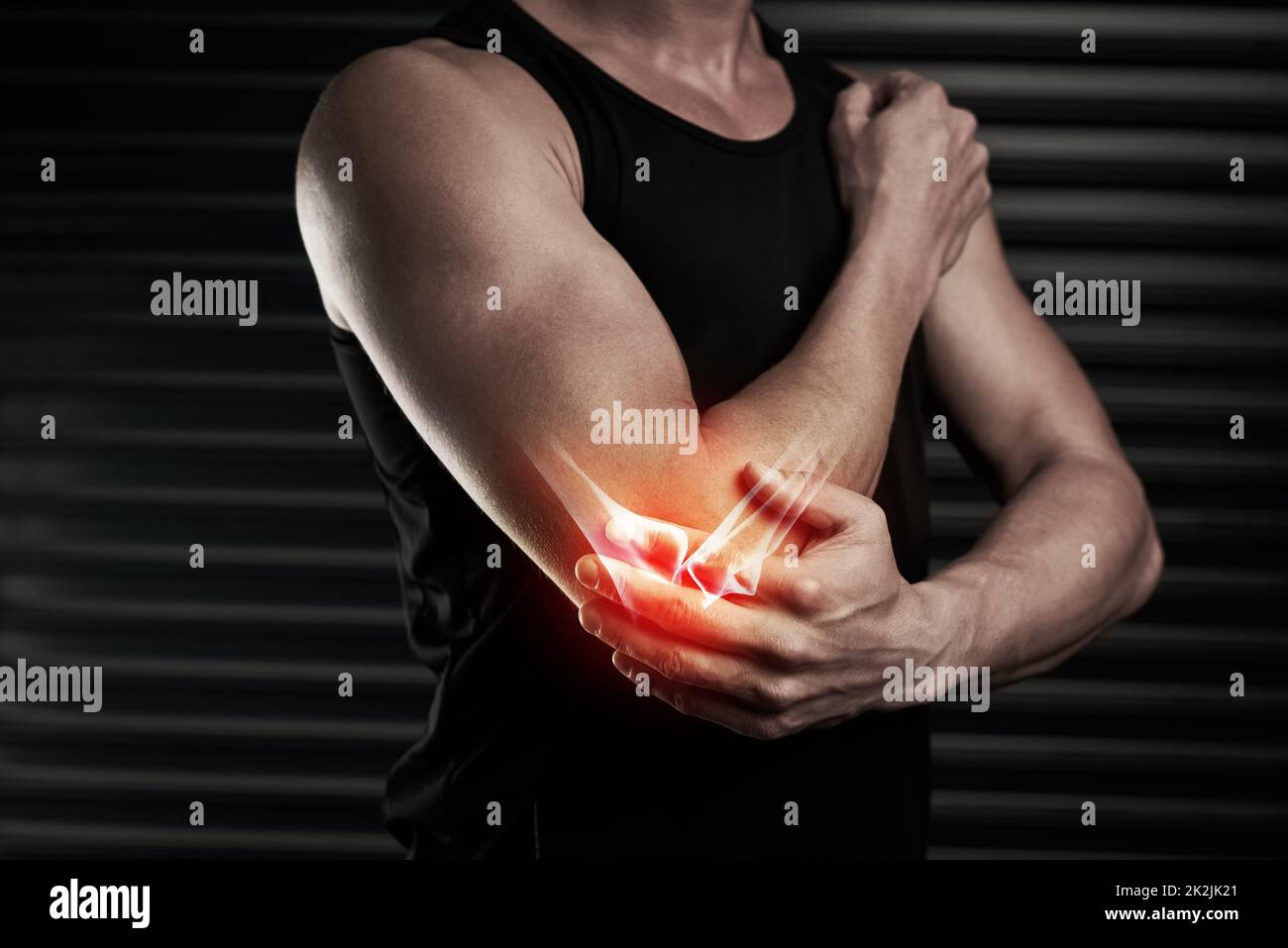 Looks like hes done some serious damage to his elbow. Shot of an ...