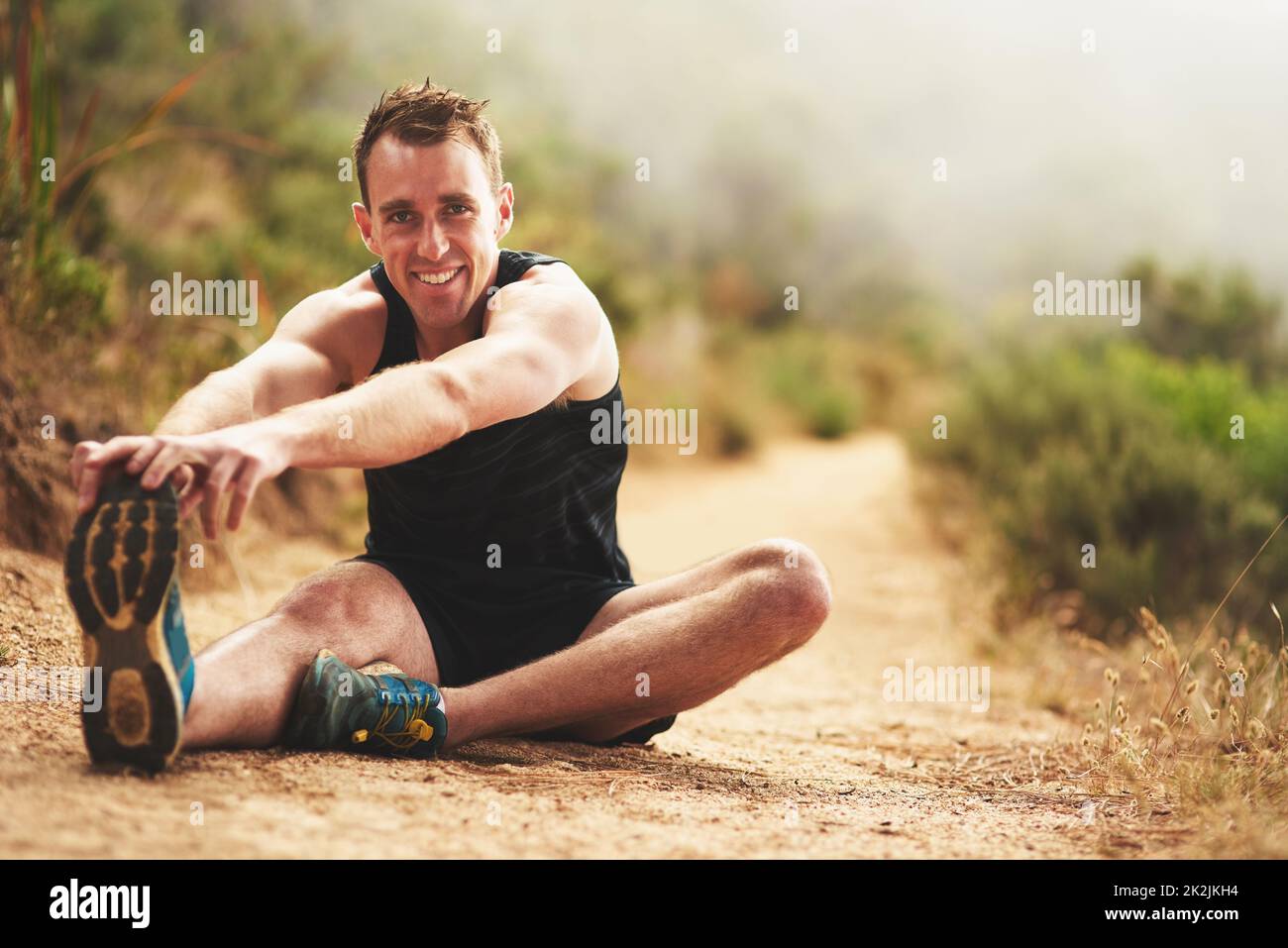 Getting ready to knockout another workout. Portrait of a sporty young ...