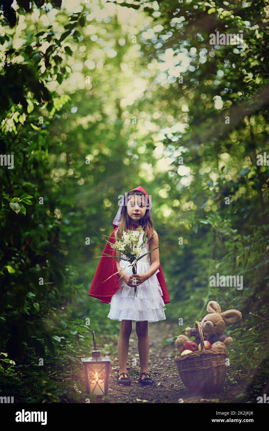 Little Girl Playing In The Woods