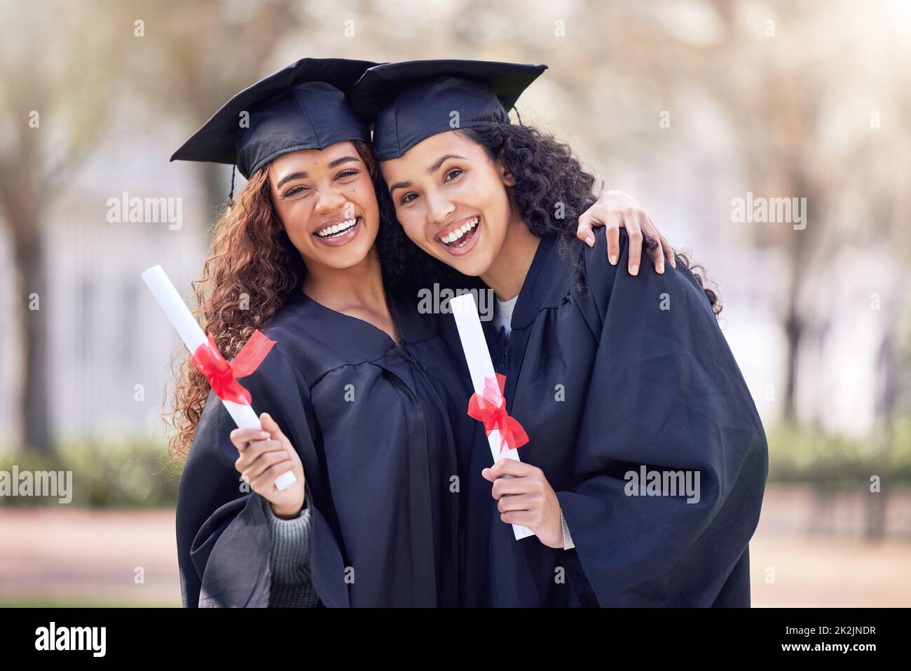 Two graduation hat hi-res stock photography and images - Alamy