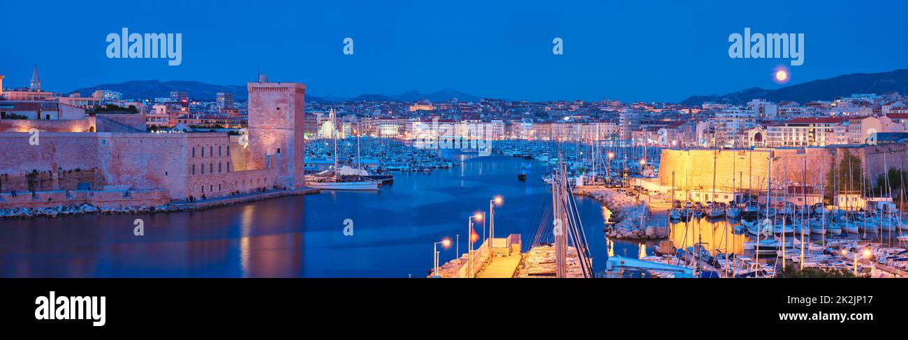 Marseille Old Port and Fort Saint-Jean in night. Marseille, France ...