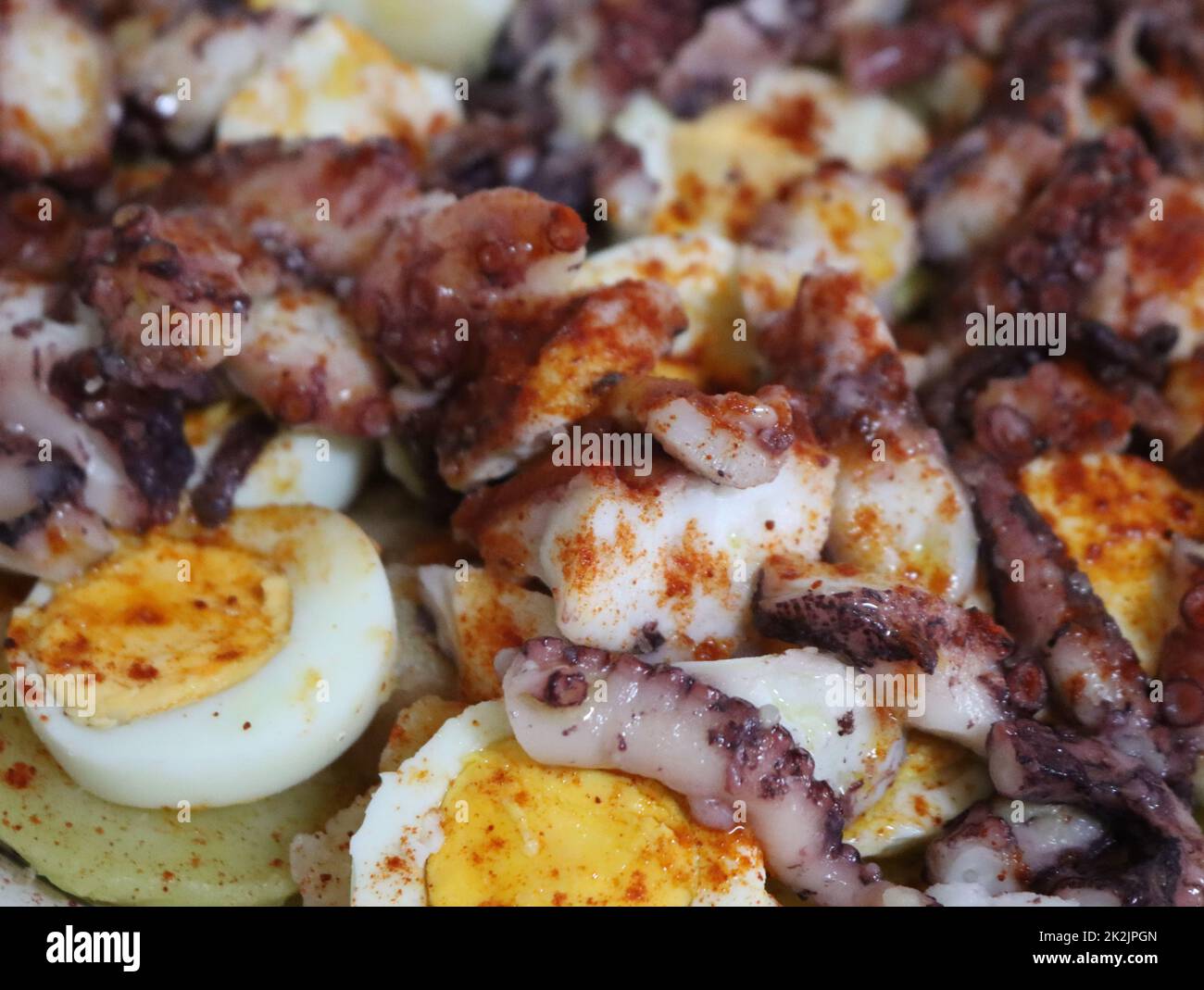 delicious typical octopus dish with potato egg paprika tasty oil Stock ...